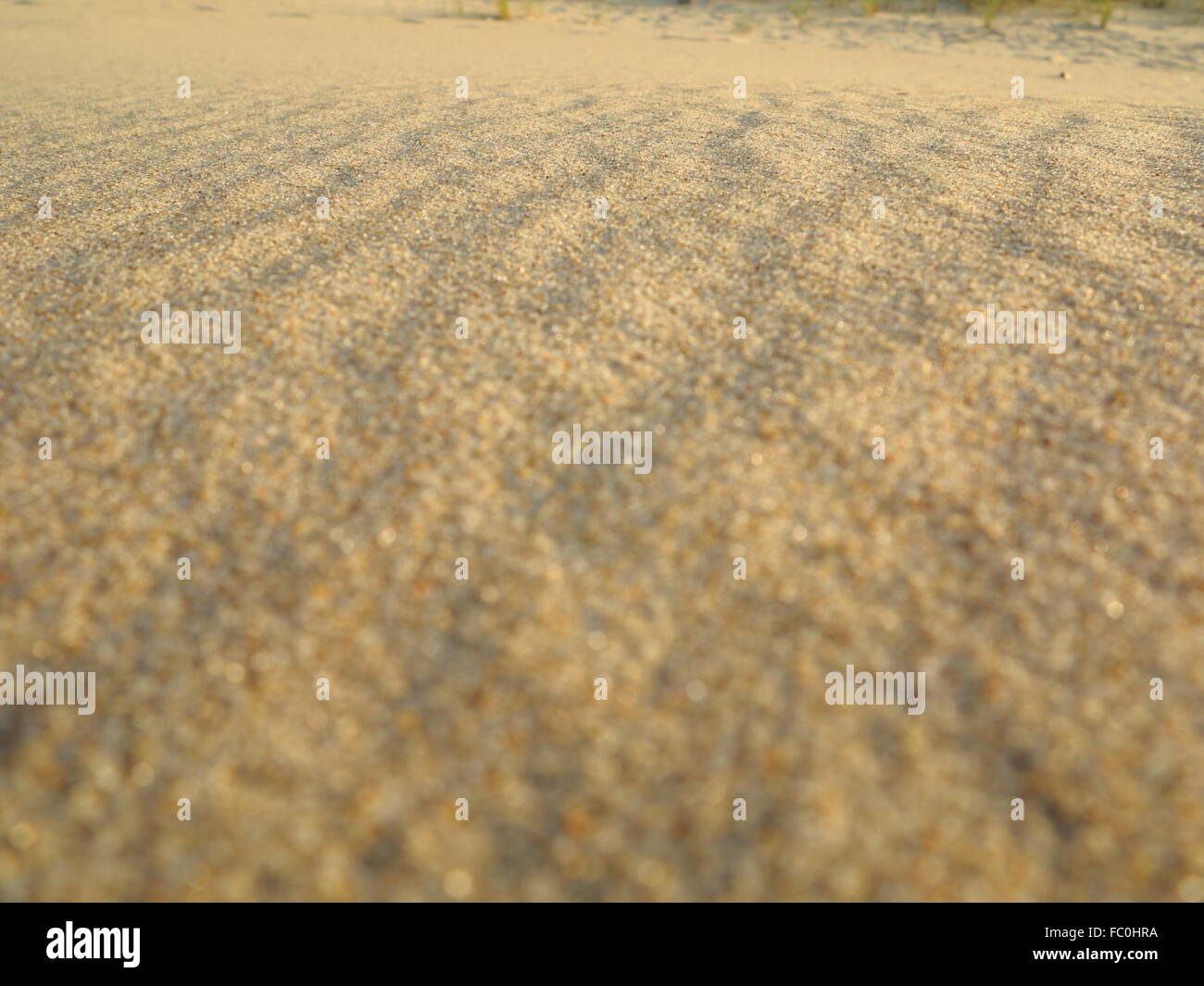 wavy yellow sand texture background Stock Photo - Alamy