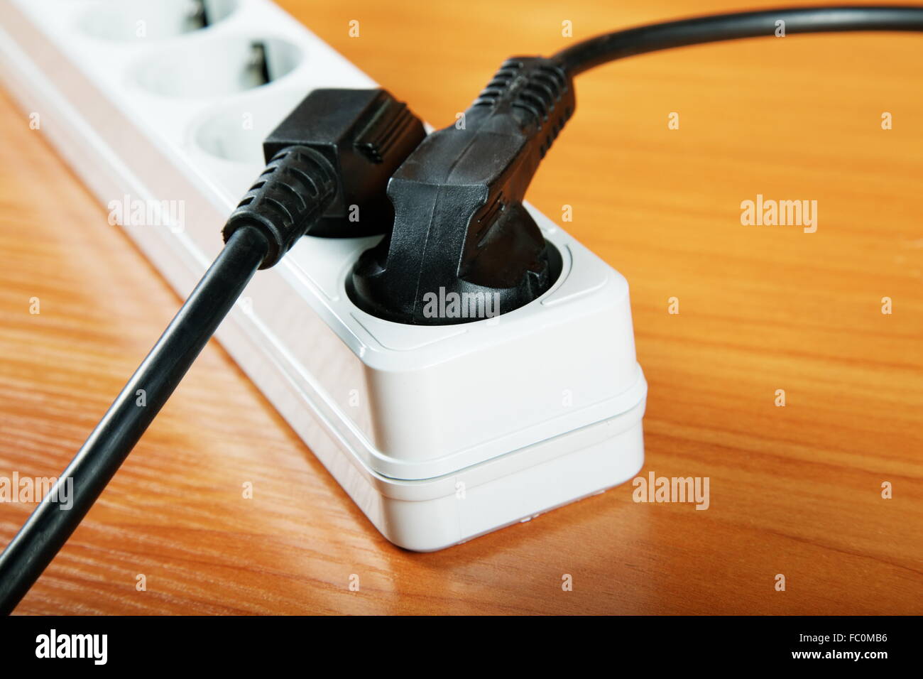 The electric extension piece with wires Stock Photo - Alamy
