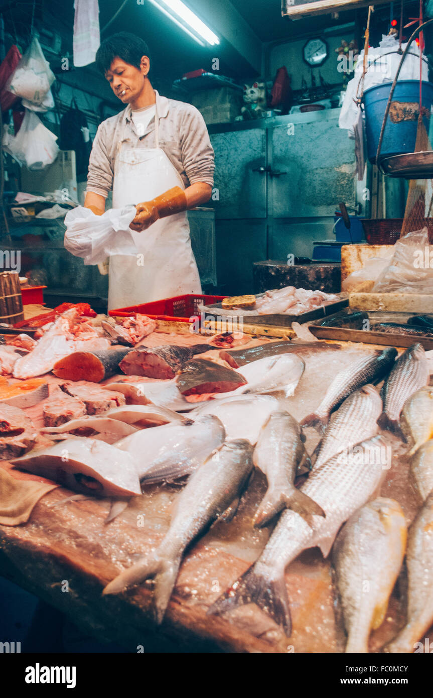 fishmonger or fish seller Stock Photo - Alamy