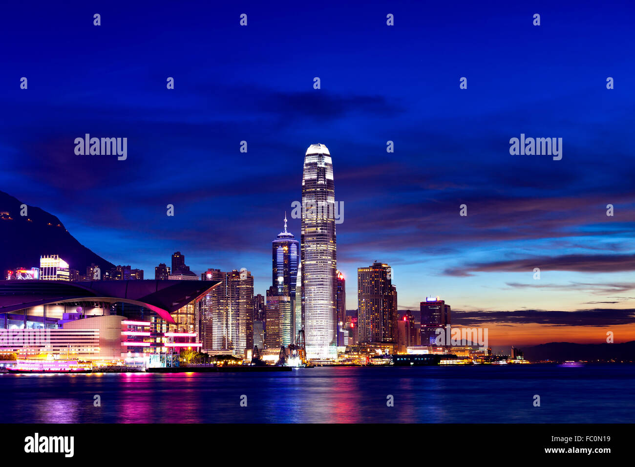 Modern city scene at night Stock Photo - Alamy