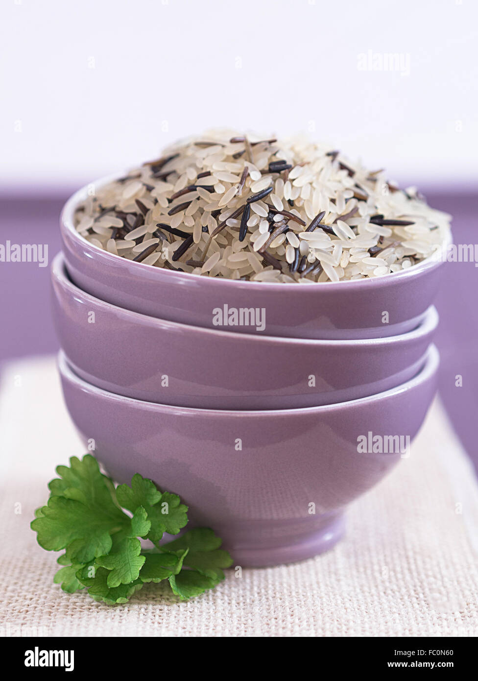 Raw rice in a bowl Stock Photo - Alamy