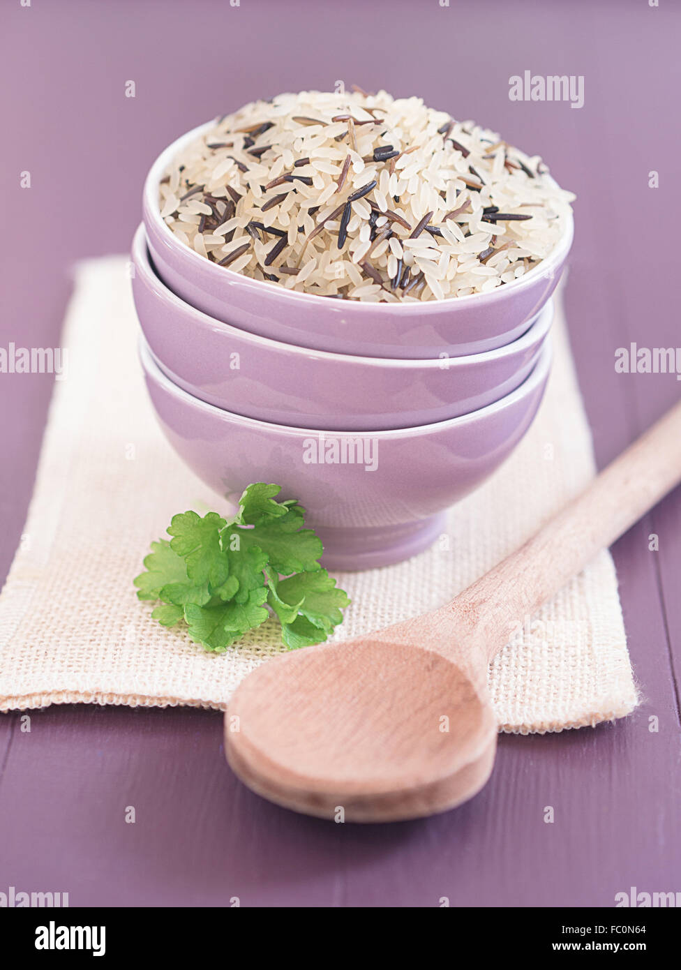 Raw rice in a bowl Stock Photo - Alamy