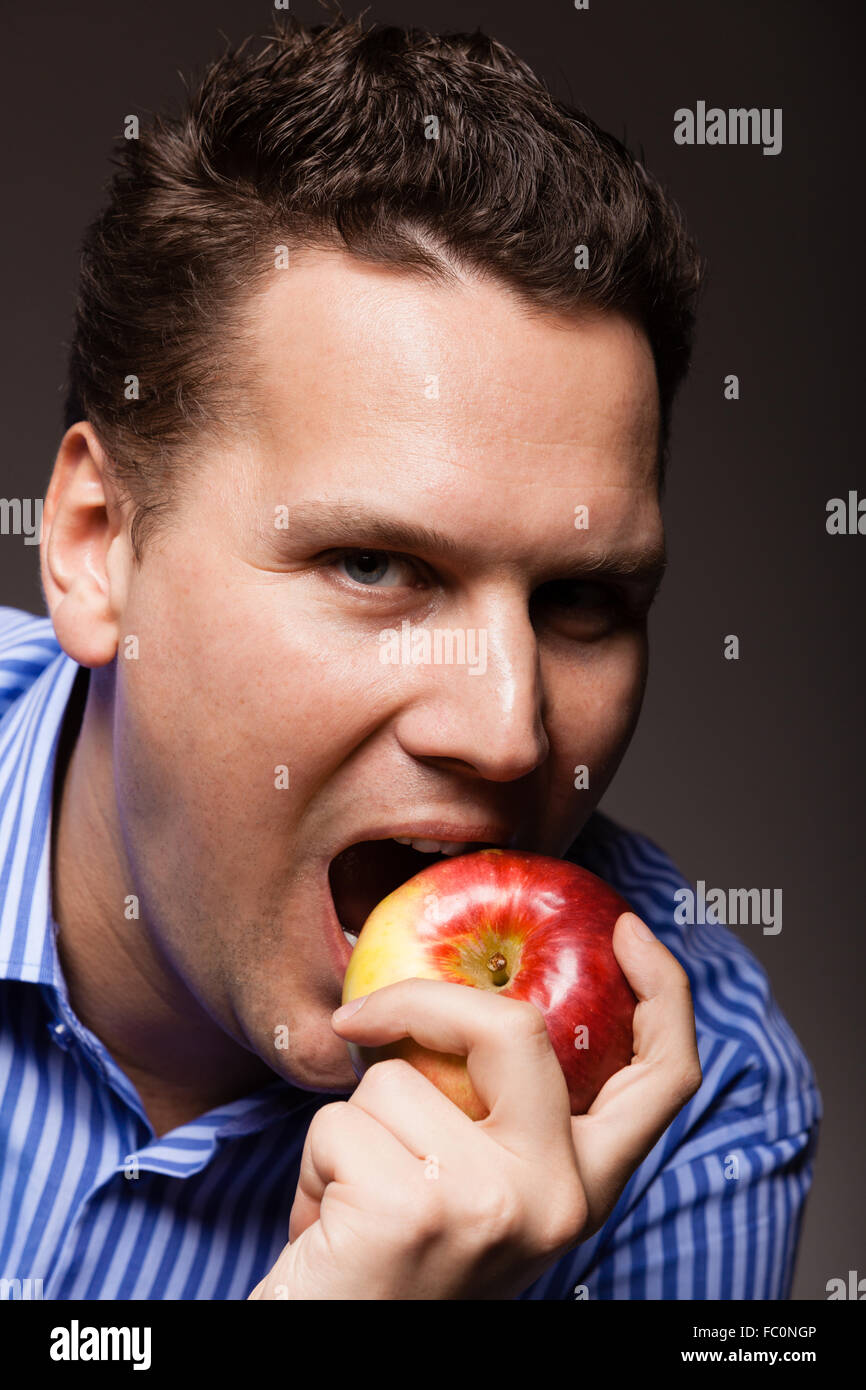 Happy man eat bite hi-res stock photography and images - Alamy