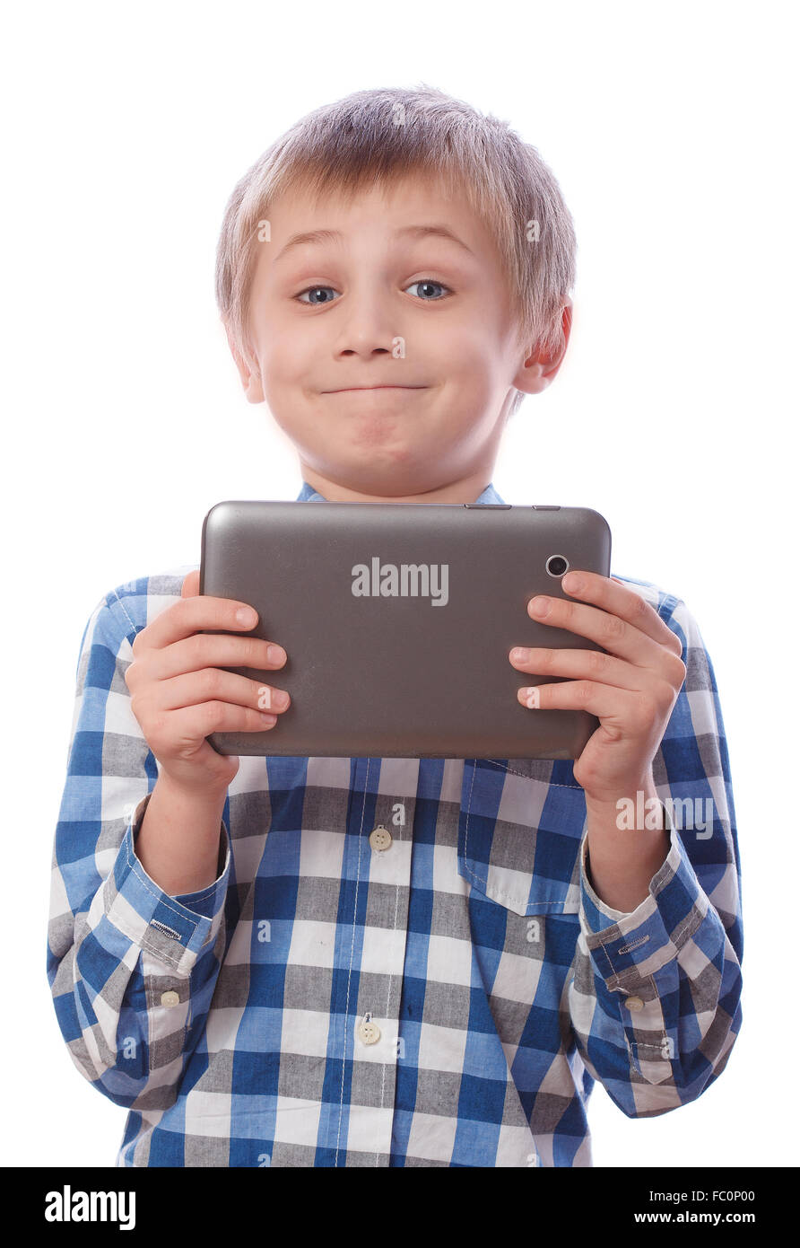 Boy with tablet on a white background Stock Photo - Alamy