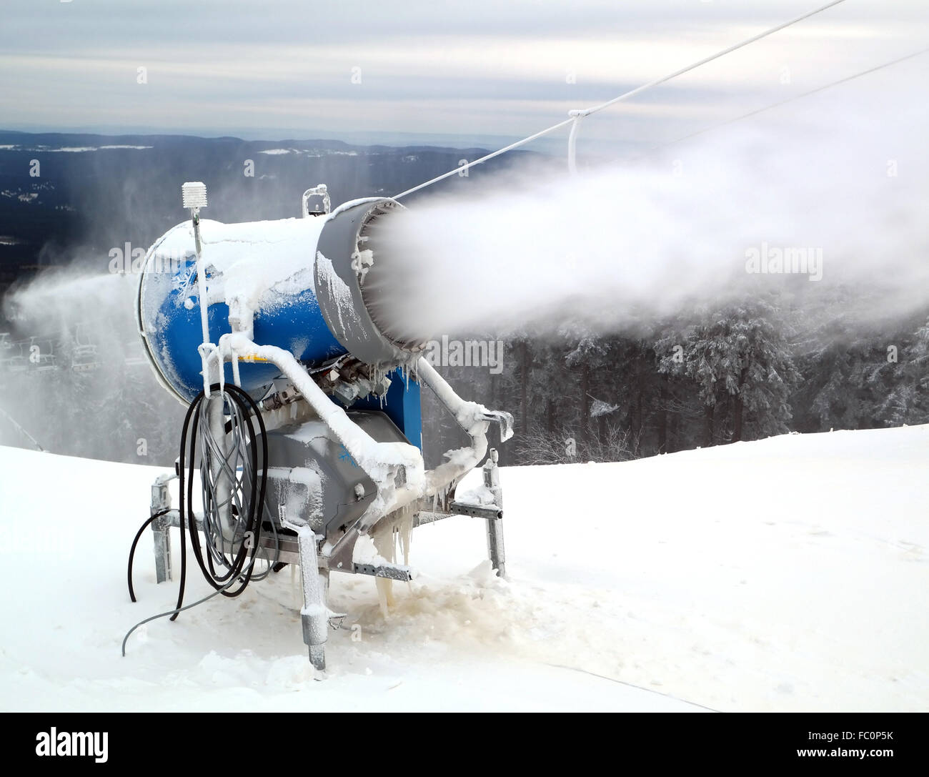 Snowmaking with snow cannon Stock Photo - Alamy