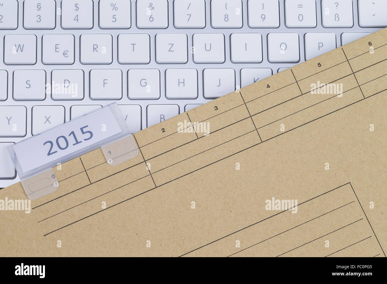 Keyboard and folder 2015 Stock Photo - Alamy