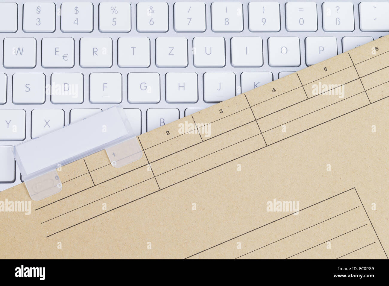 Keyboard and folder Stock Photo - Alamy