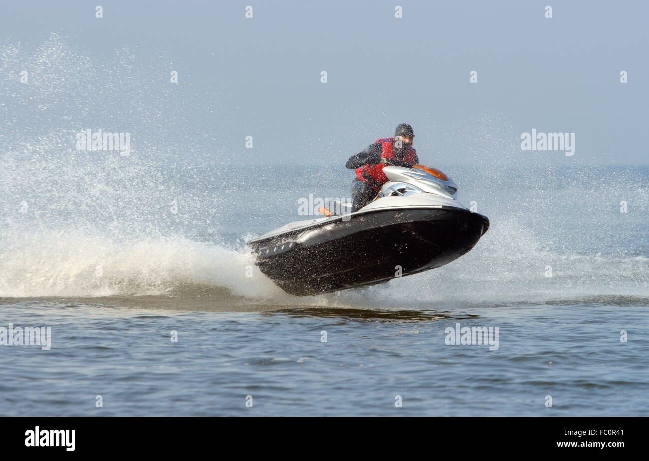 Boy on jet ski hi-res stock photography and images - Alamy