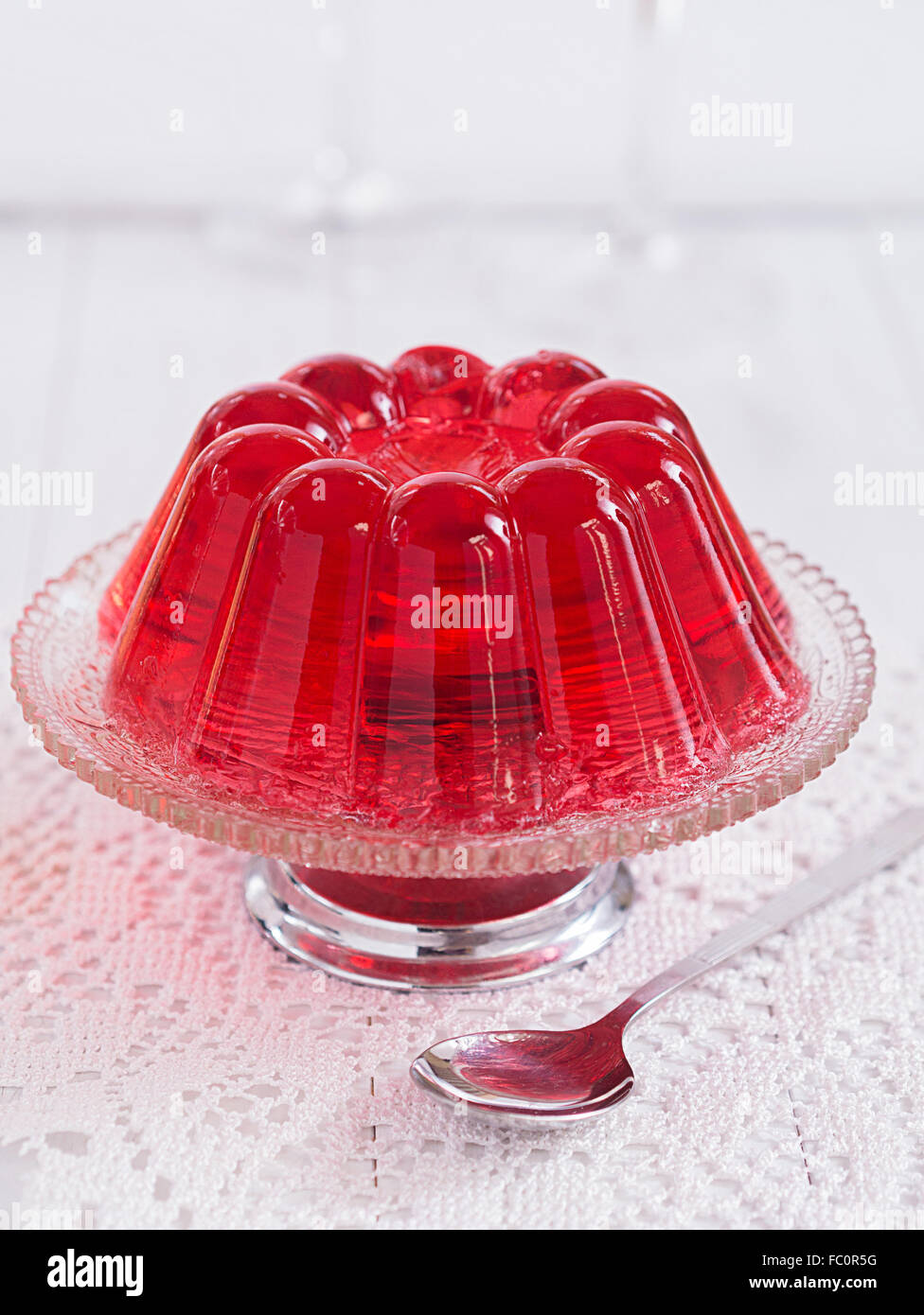 Red jello on a plate Stock Photo - Alamy