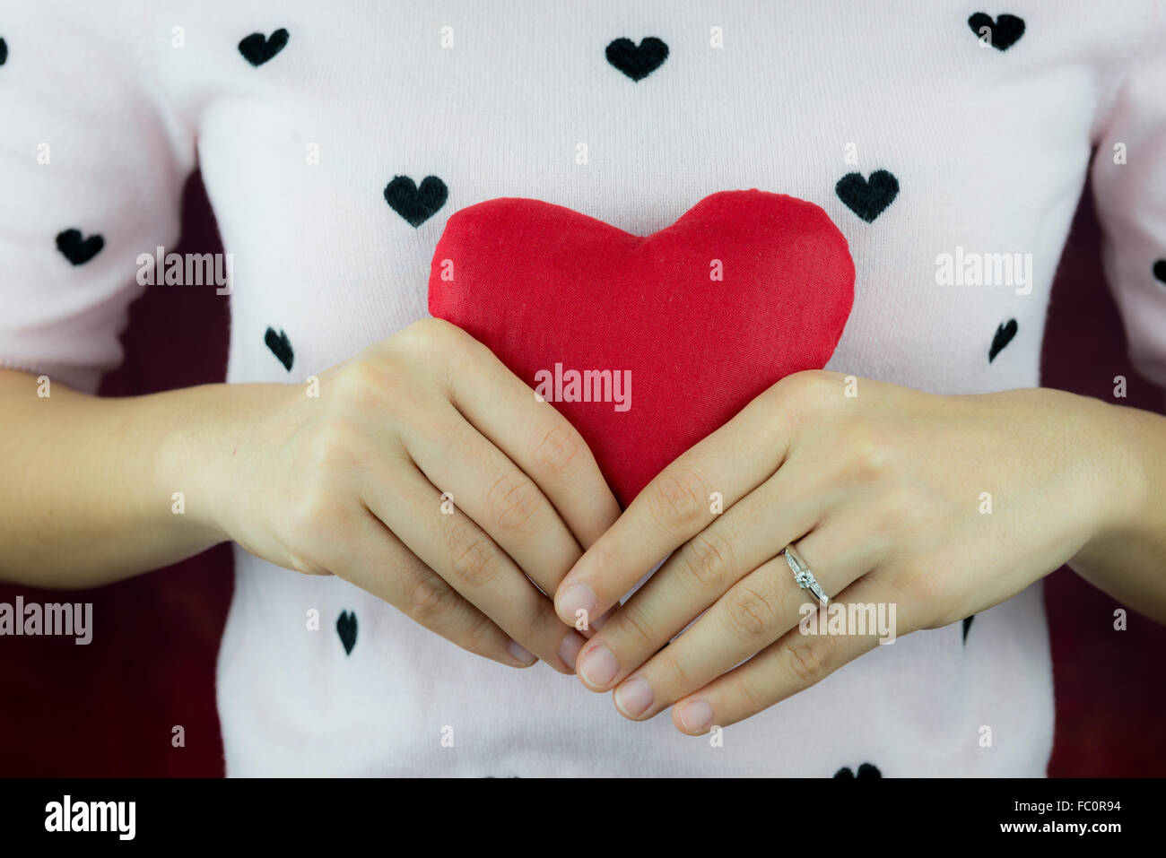 red heart in hands with heart gesture, valentine's concept Stock Photo ...