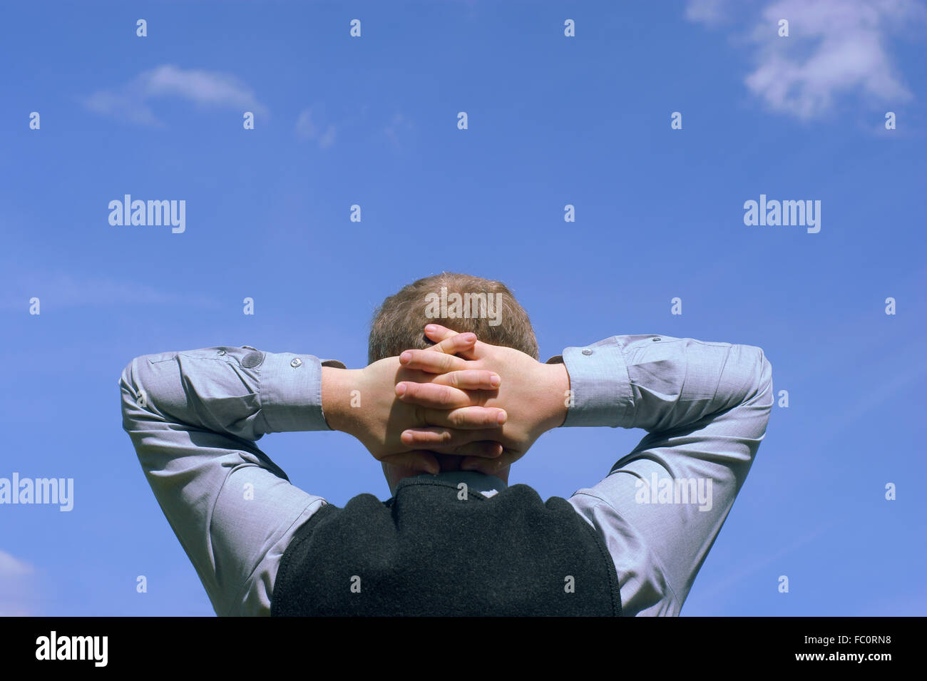 Business relax of the businessman and blue sky Stock Photo - Alamy