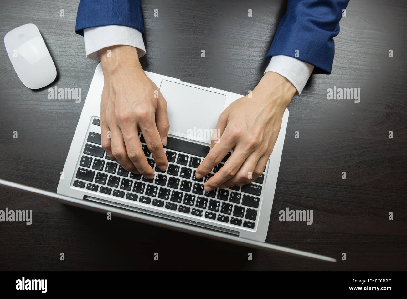 Man in business suit typing hi-res stock photography and images - Alamy