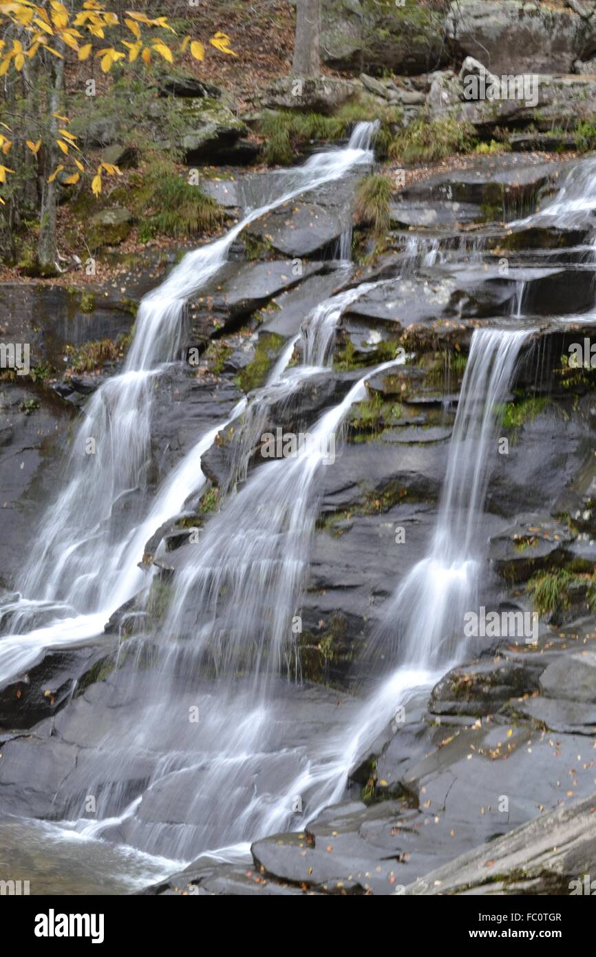 Sliding down the rocks Stock Photo - Alamy