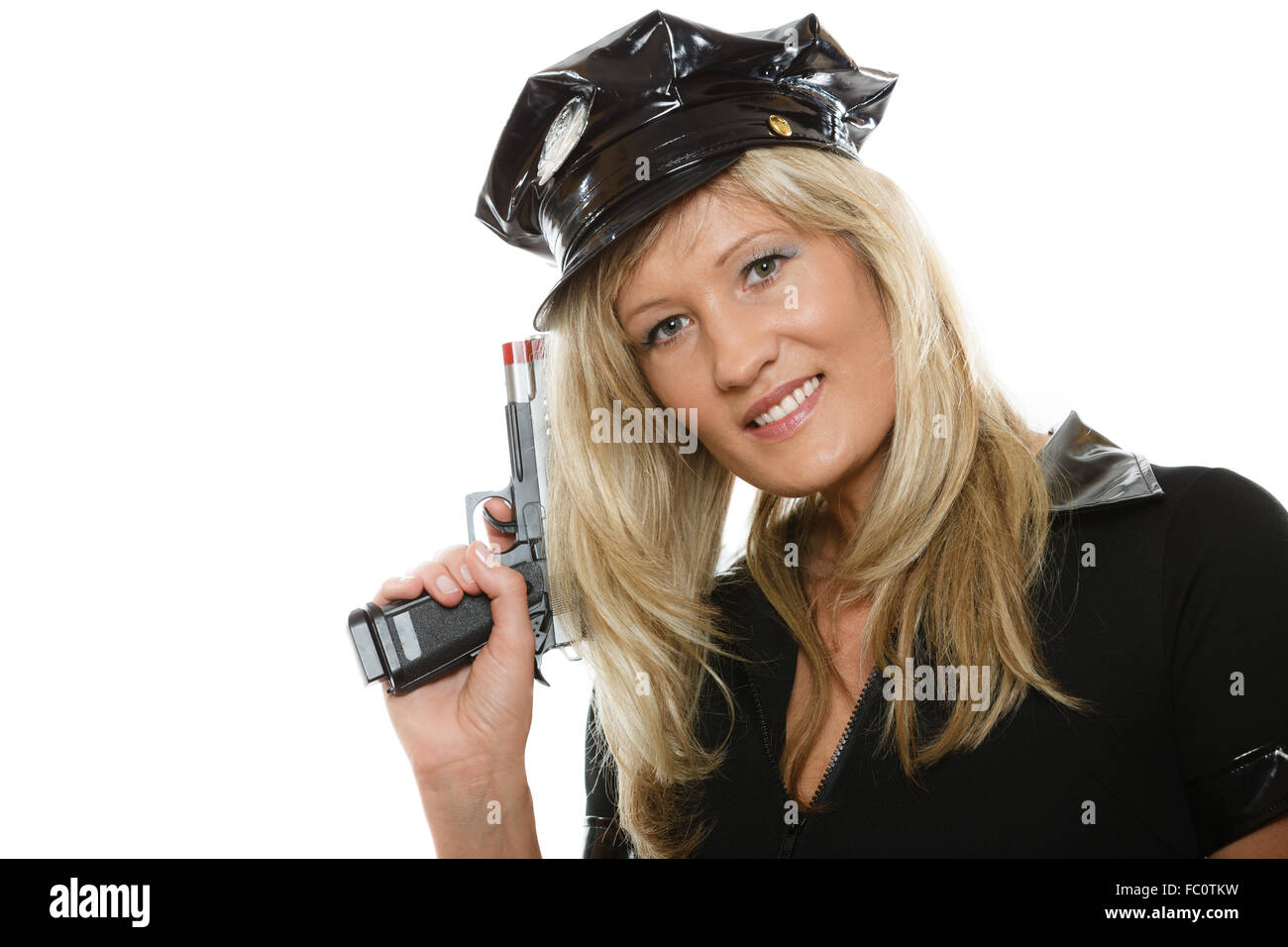 Policewoman cop with gun Stock Photo - Alamy