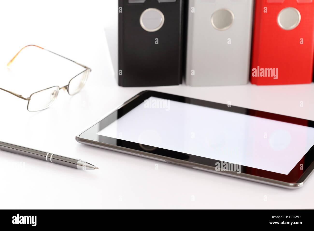 tablet computer with folder Stock Photo - Alamy
