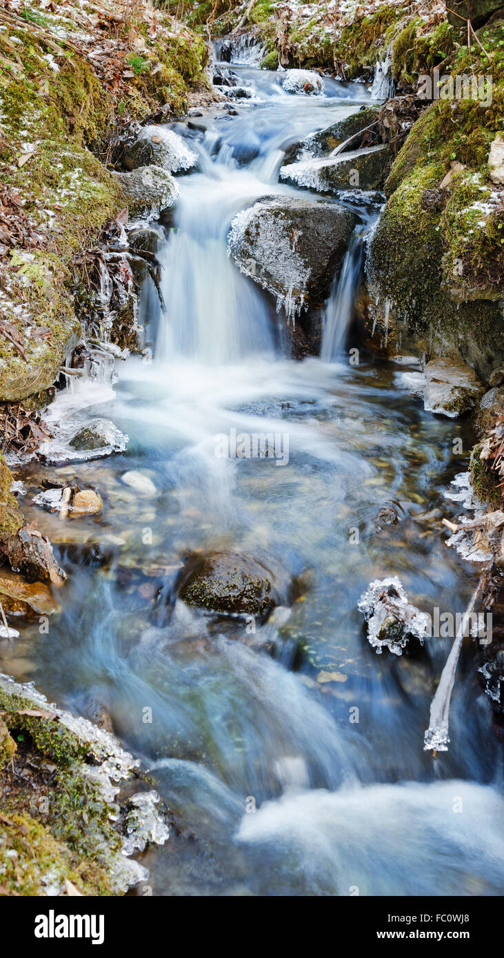 Small creek with a waterfall close up Stock Photo - Alamy