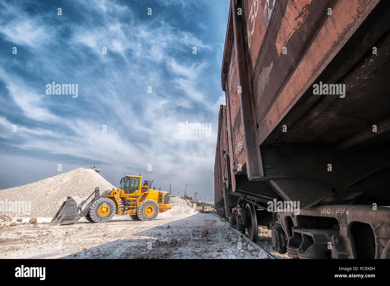 Excavator loader with backhoe works Stock Photo - Alamy