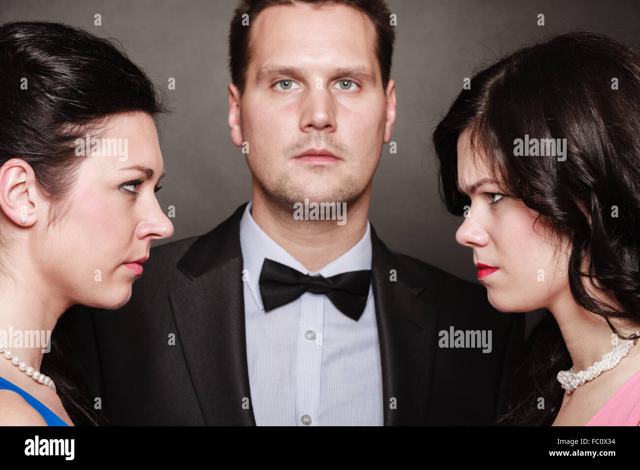 Relations between men and women - triangle Stock Photo - Alamy