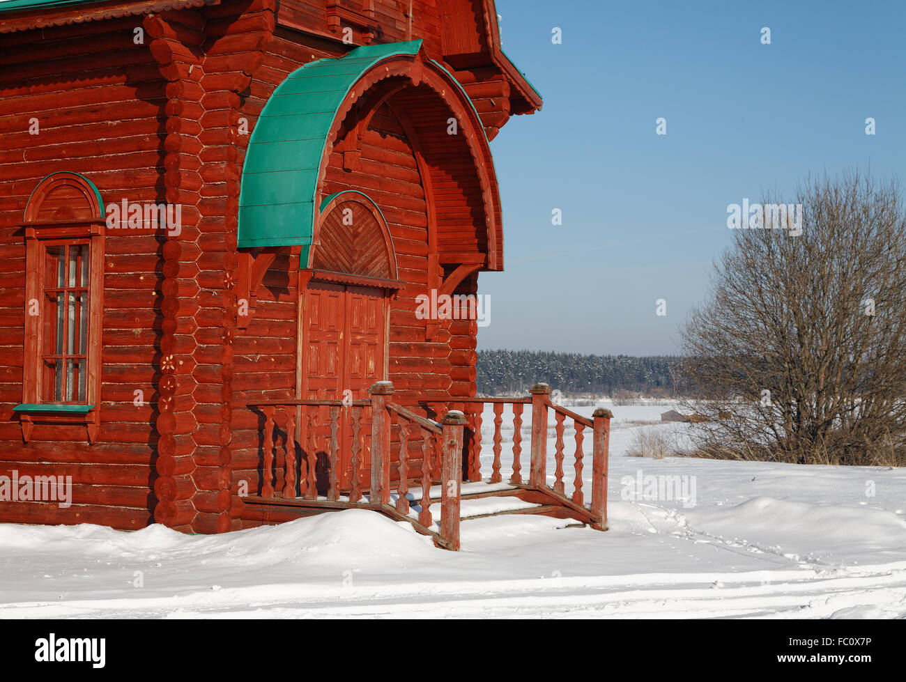 The Russian house from logs in the winter Stock Photo - Alamy