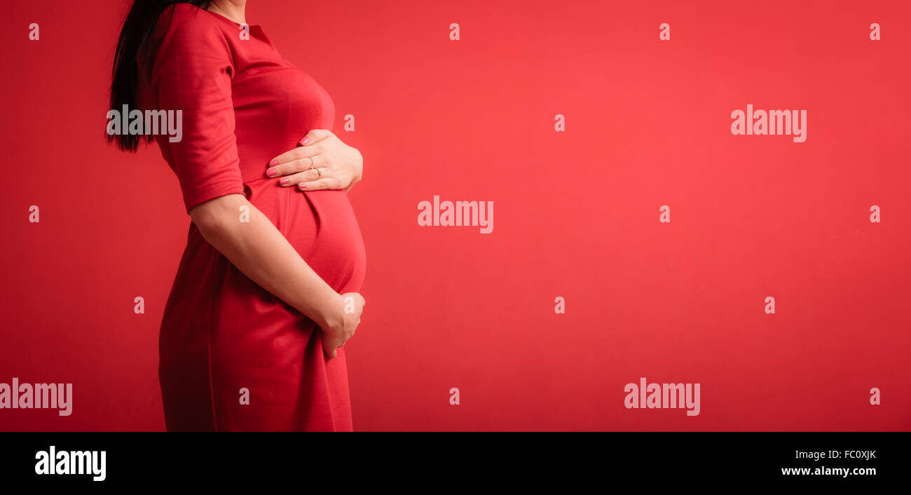 Tummy of pregnant woman hi-res stock photography and images - Alamy