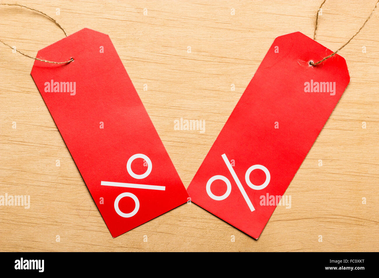 Red price label with percent sign Stock Photo - Alamy