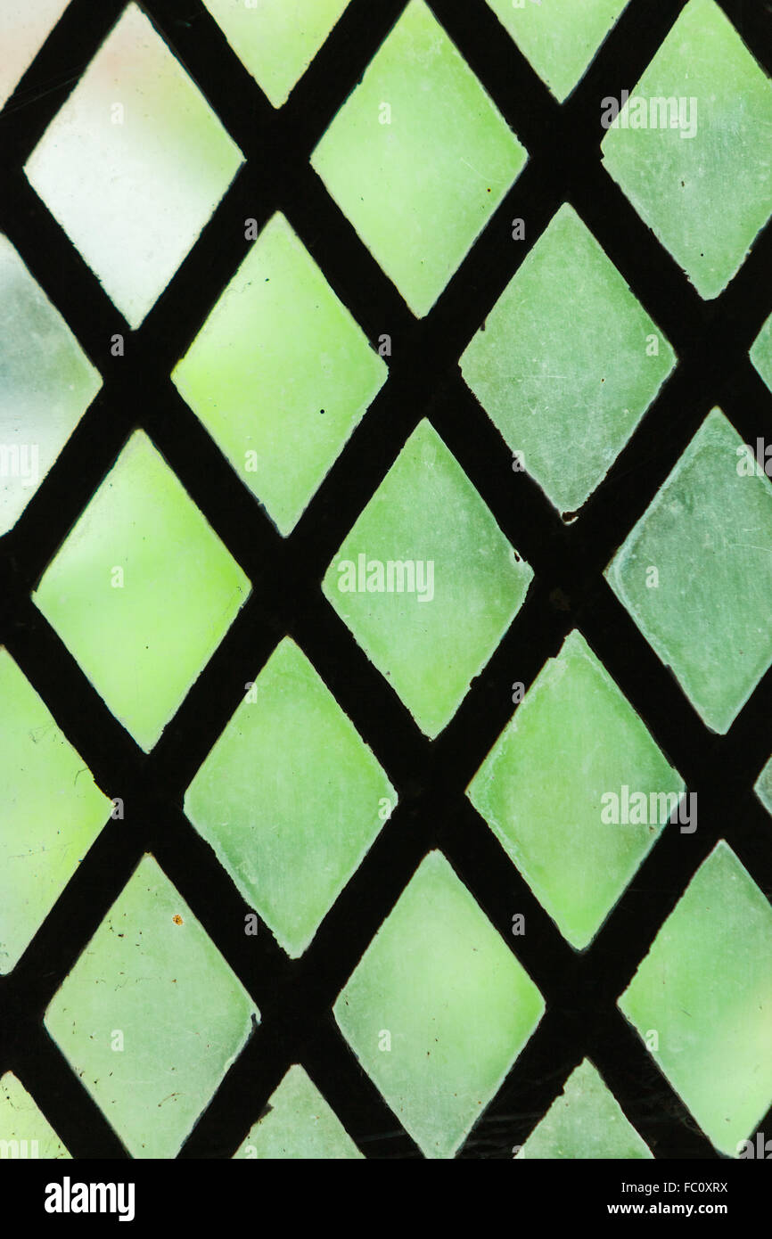 green stained glass window with regular block pattern Stock Photo - Alamy