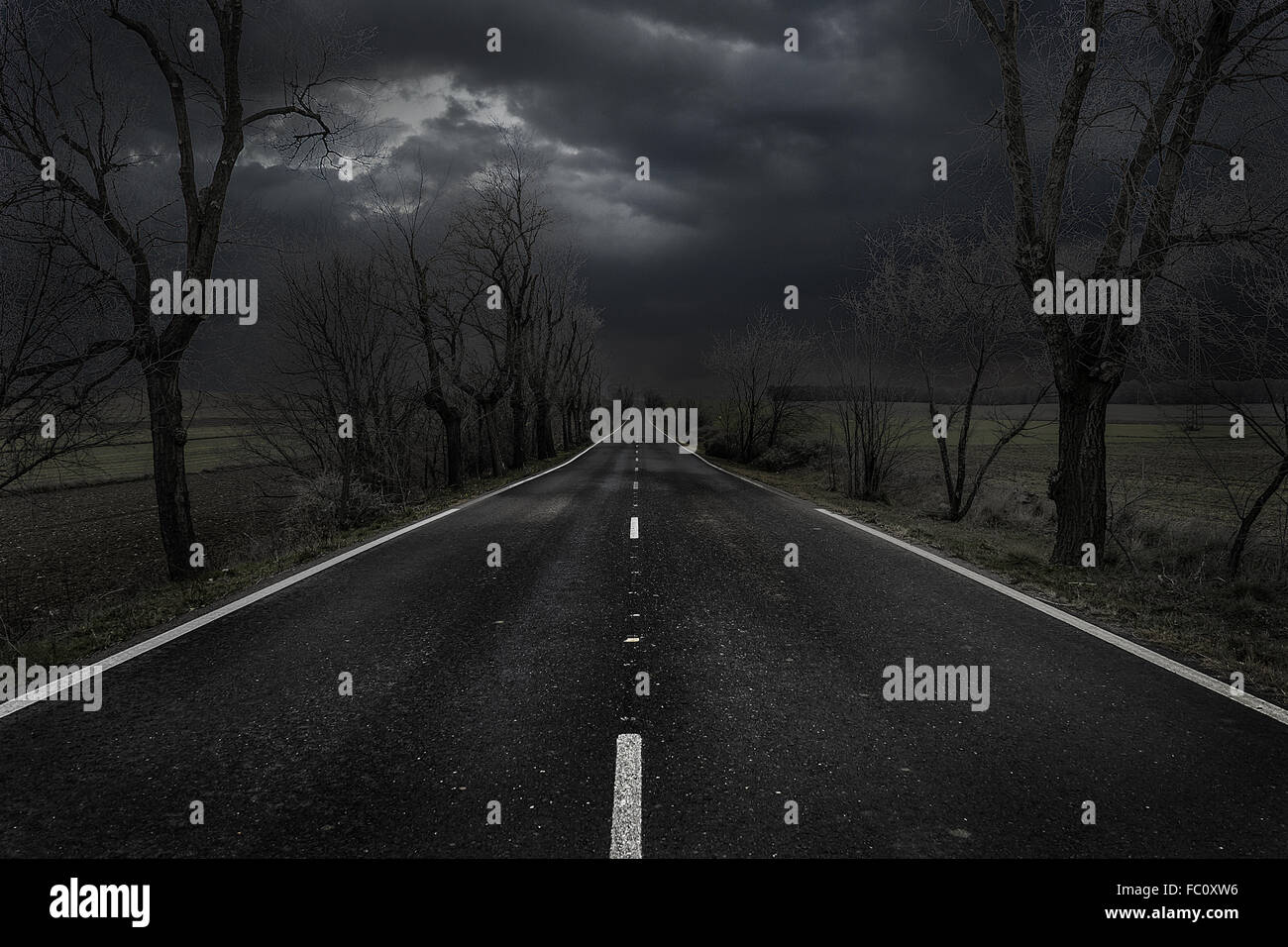 abandoned road desolate landscape at sunset Stock Photo - Alamy