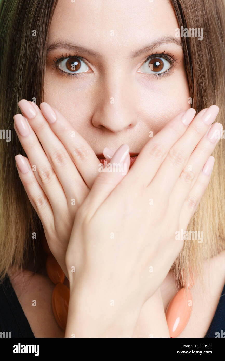 Hand over your mouth and shy hi-res stock photography and images - Alamy