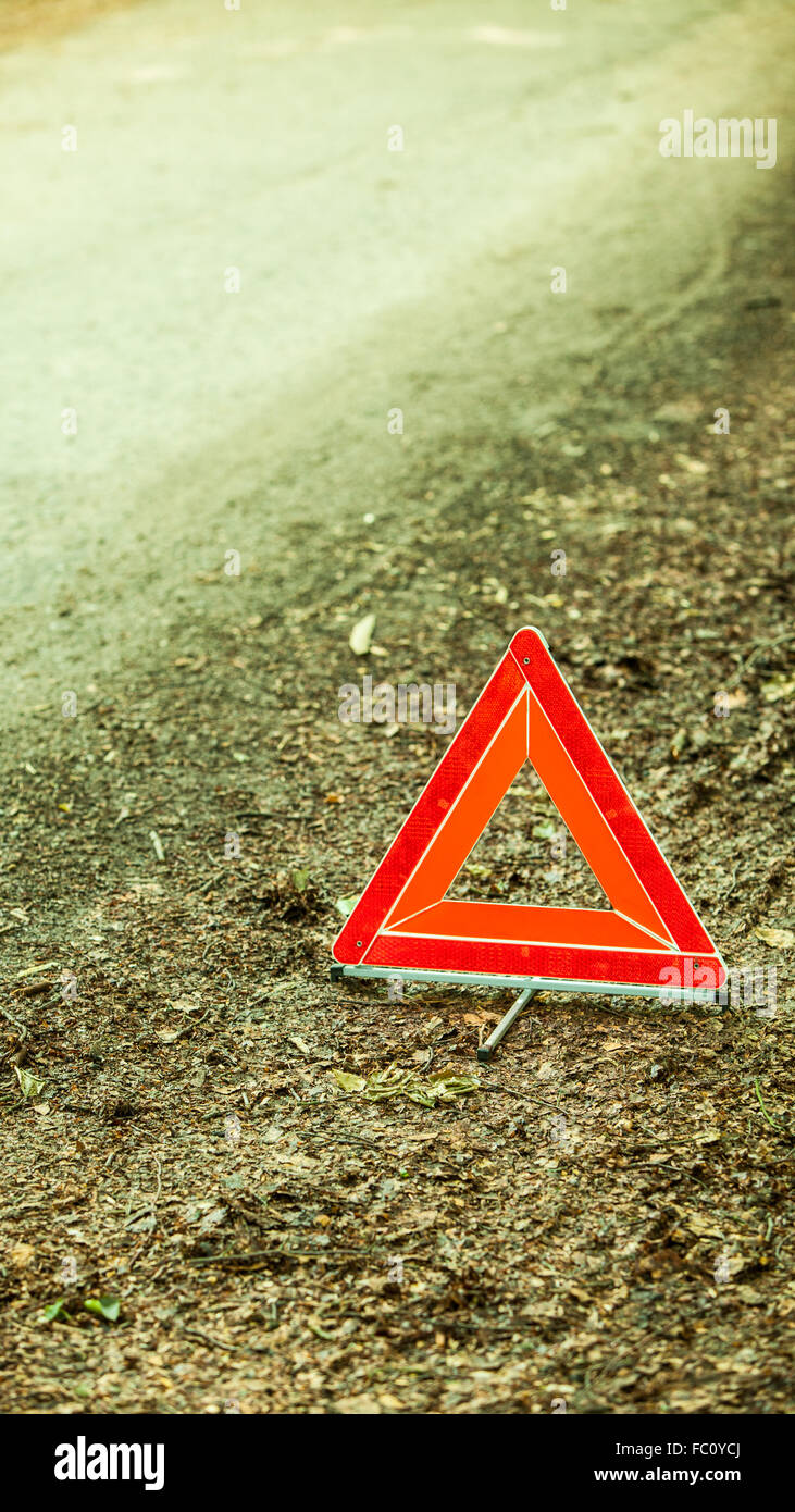 Breakdown of car. Red warning triangle sign on road Stock Photo - Alamy