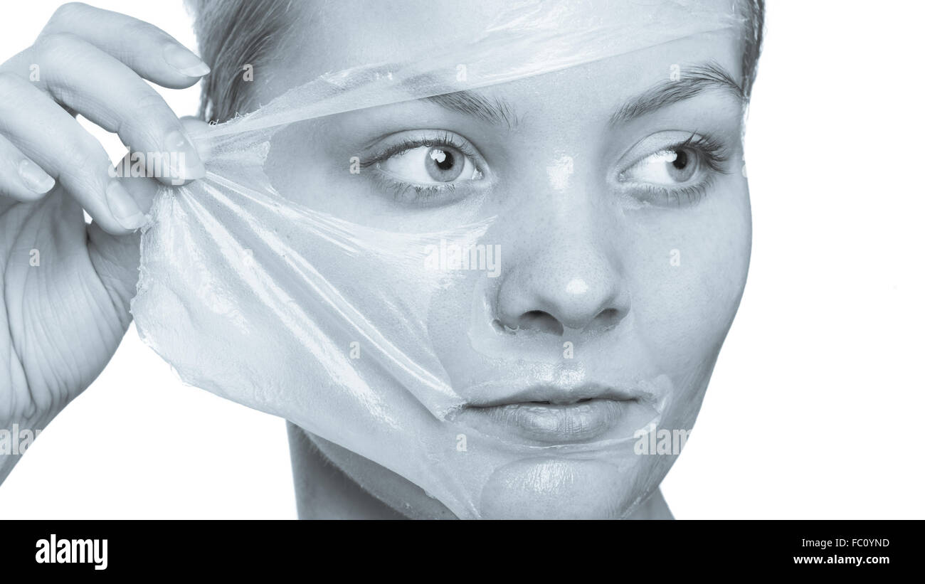 Removing peel off mask hi-res stock photography and images - Alamy