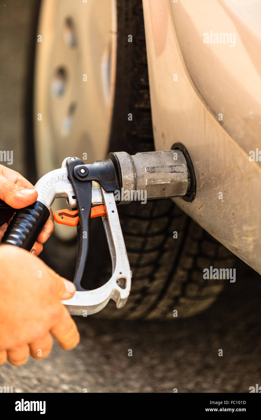 Person filling car with gas hi-res stock photography and images - Alamy
