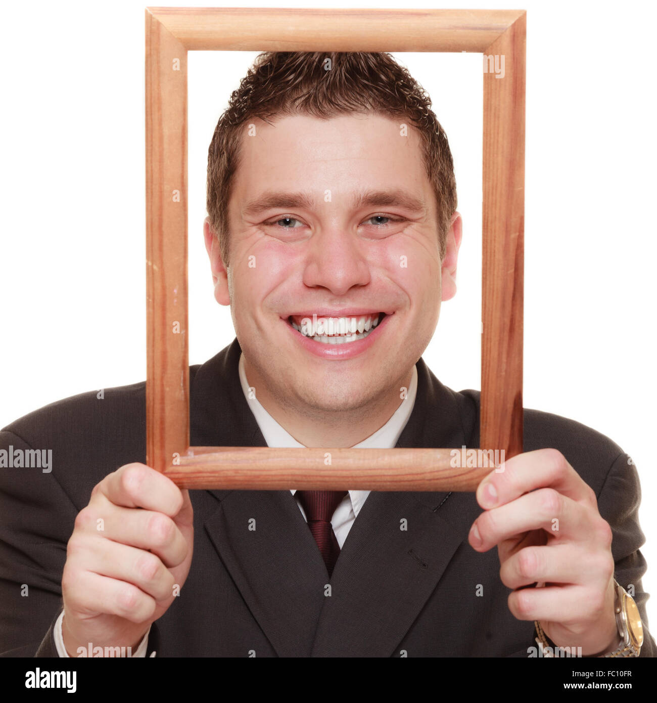 Business man framing his face with wood frame Stock Photo - Alamy