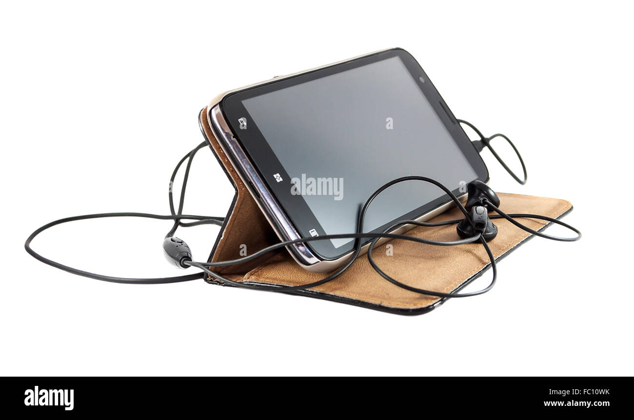 Smartphone with headphones Stock Photo - Alamy