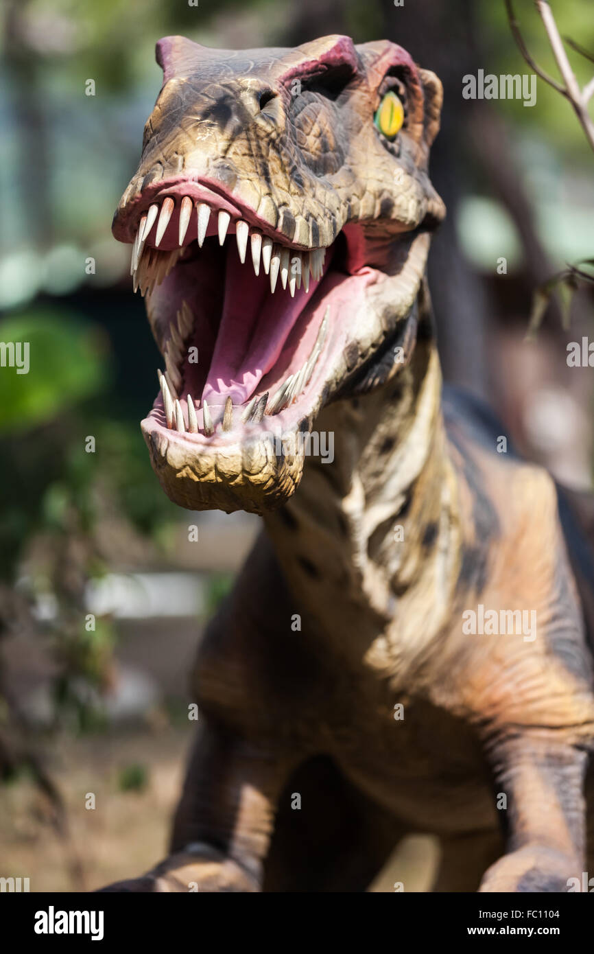 Dinosaur showing his toothy mouth Stock Photo - Alamy