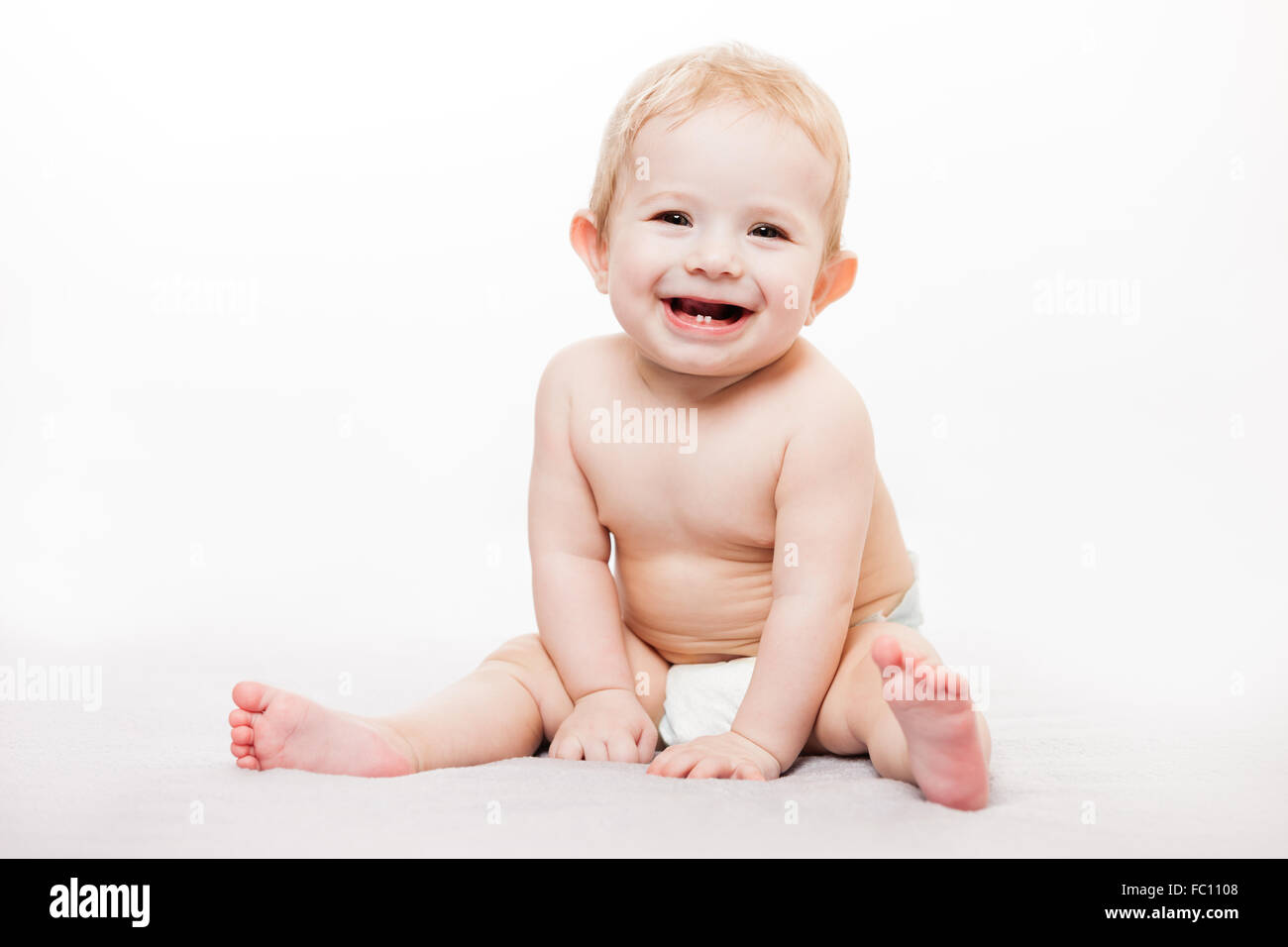 Little cute smiling newborn baby child Stock Photo - Alamy