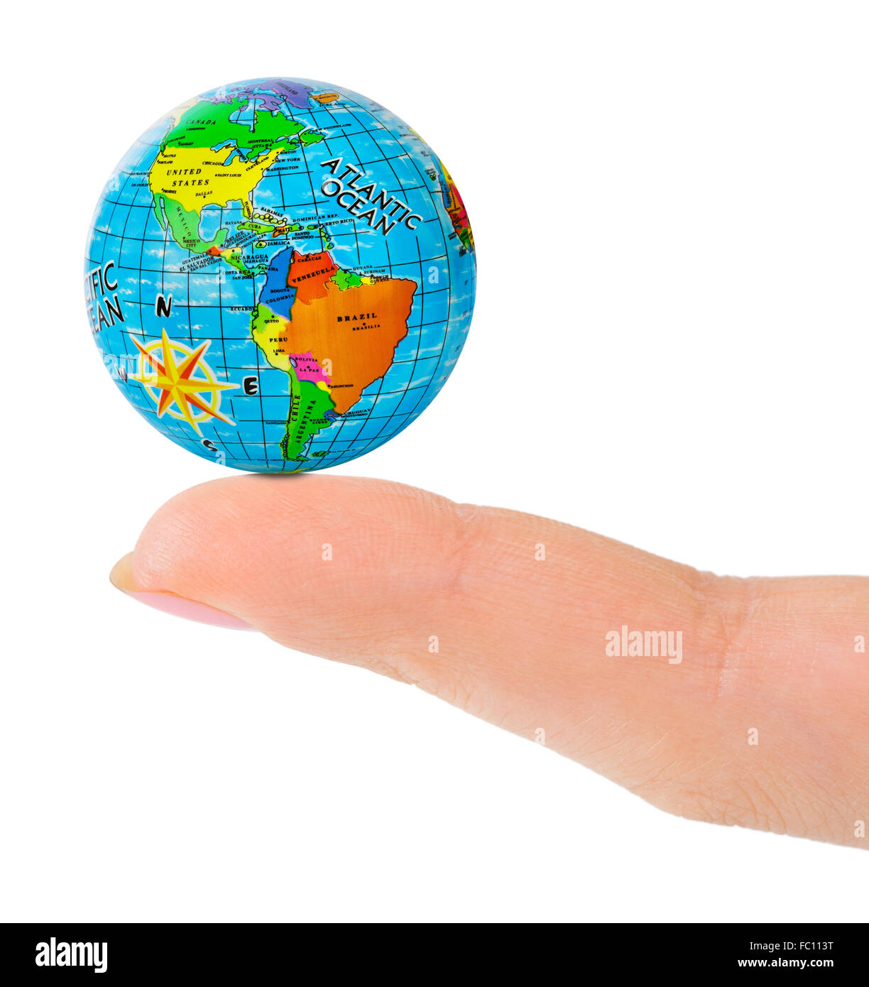 Finger and globe Stock Photo - Alamy