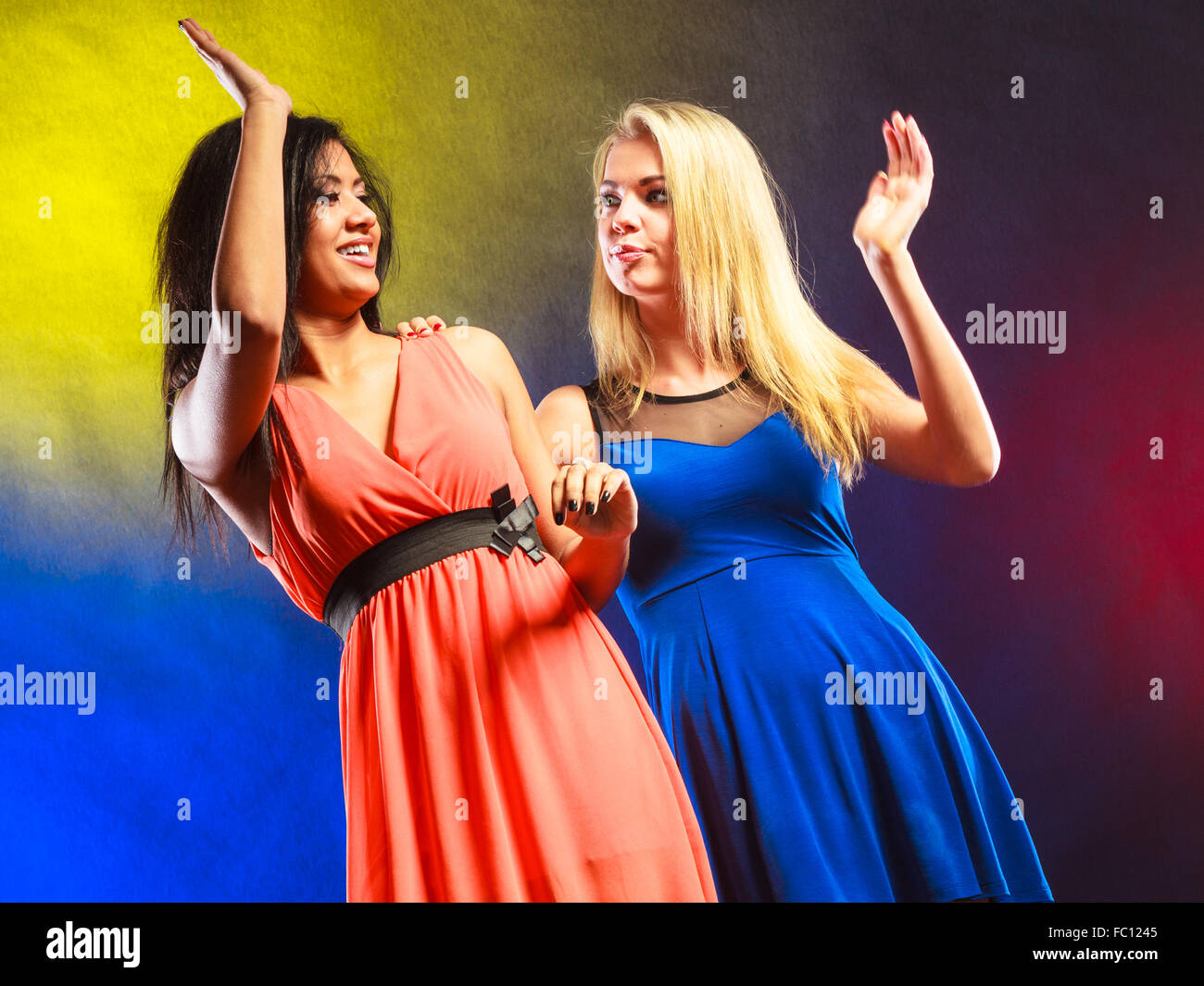 Two girls holding hands symbol hi-res stock photography and images - Alamy