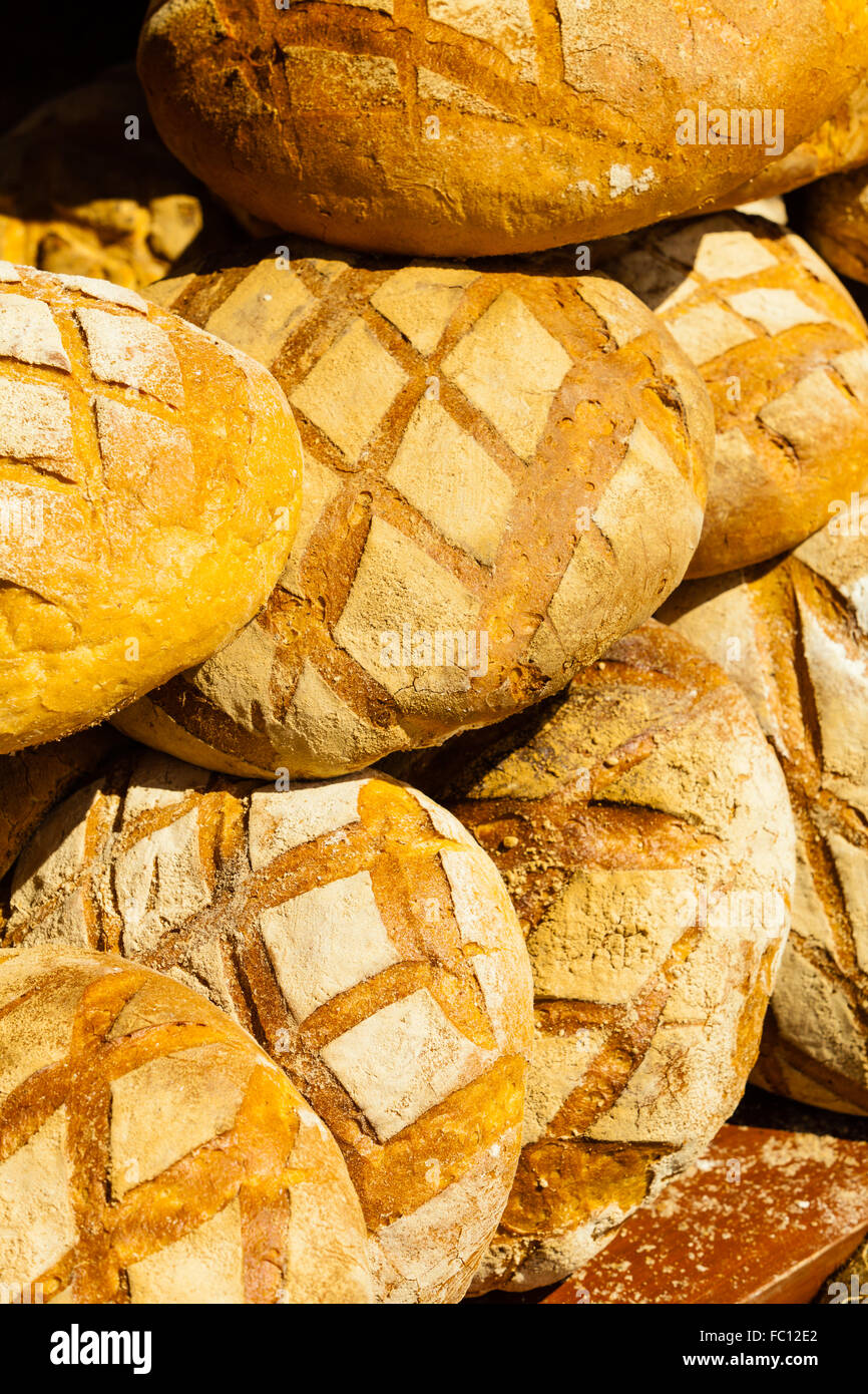many brown rustic fresh rye bread loaves Stock Photo - Alamy