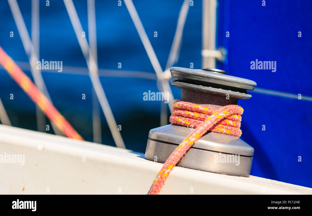 Winch capstan with rope on sailing boat Stock Photo - Alamy