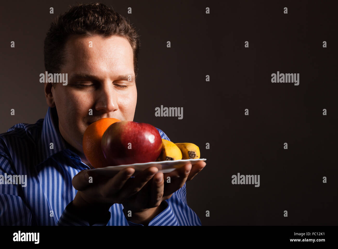Smelling Fruit High Resolution Stock Photography and Images - Alamy
