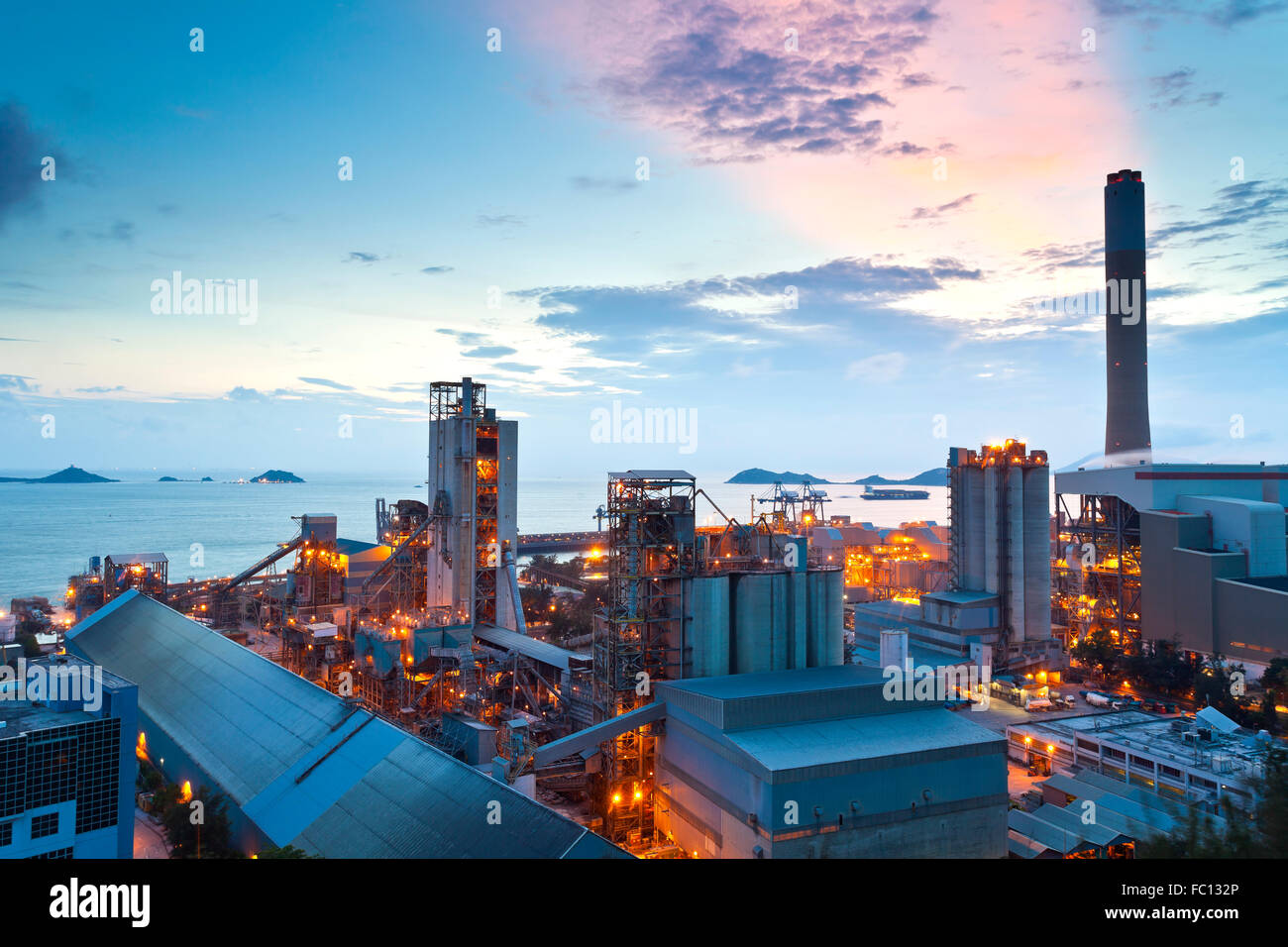 Sunset at power plant in Hong Kong Stock Photo - Alamy