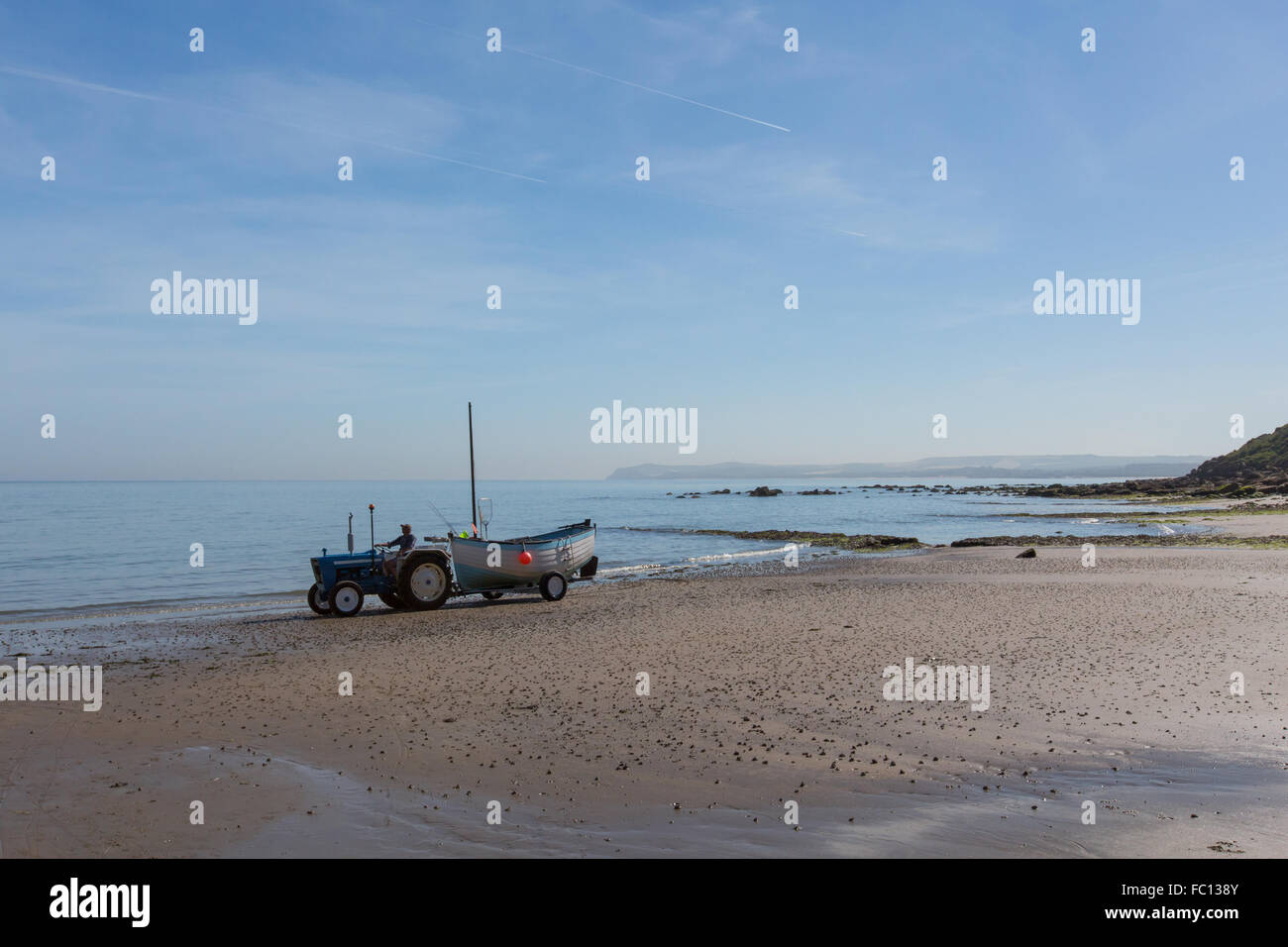 A tractor at a beach Stock Photo - Alamy