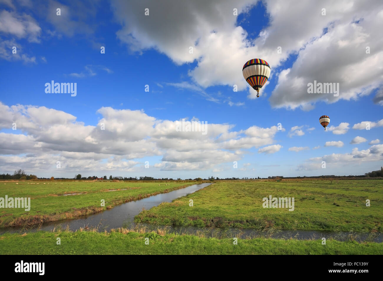The balloon flies over the plains Stock Photo - Alamy