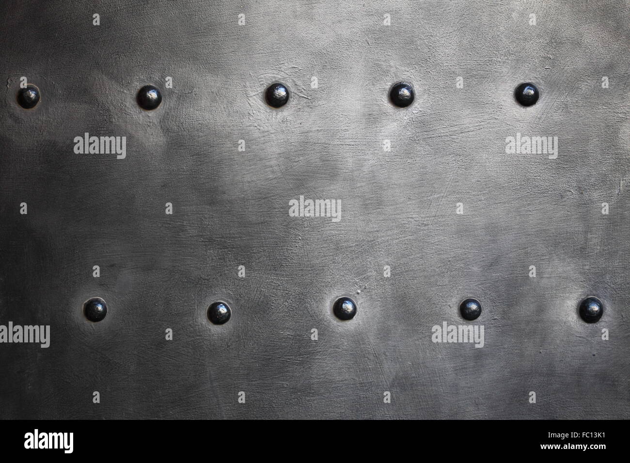 Grunge black metal plate rivets hi-res stock photography and images - Alamy