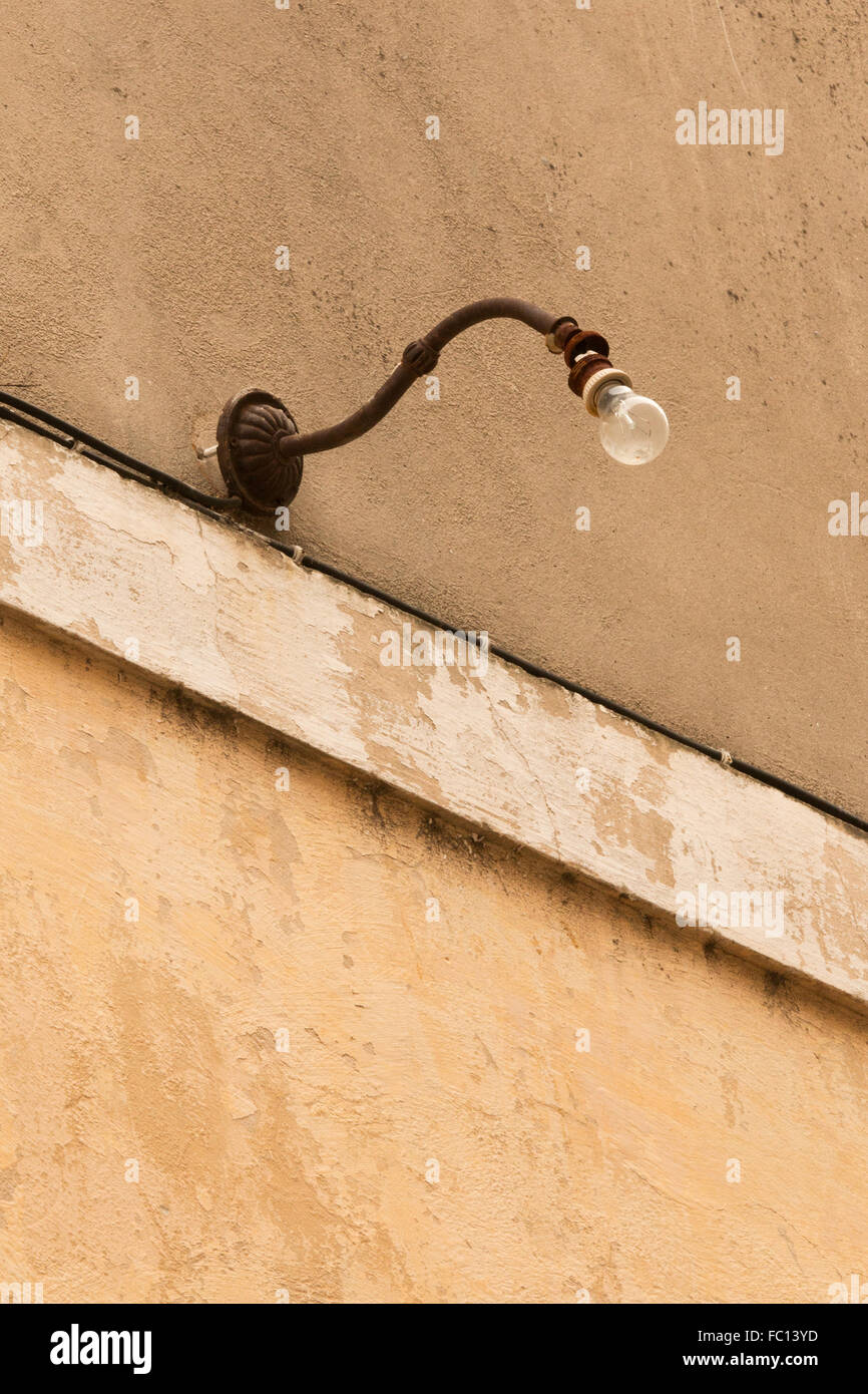 A lamp on a house wall Stock Photo - Alamy