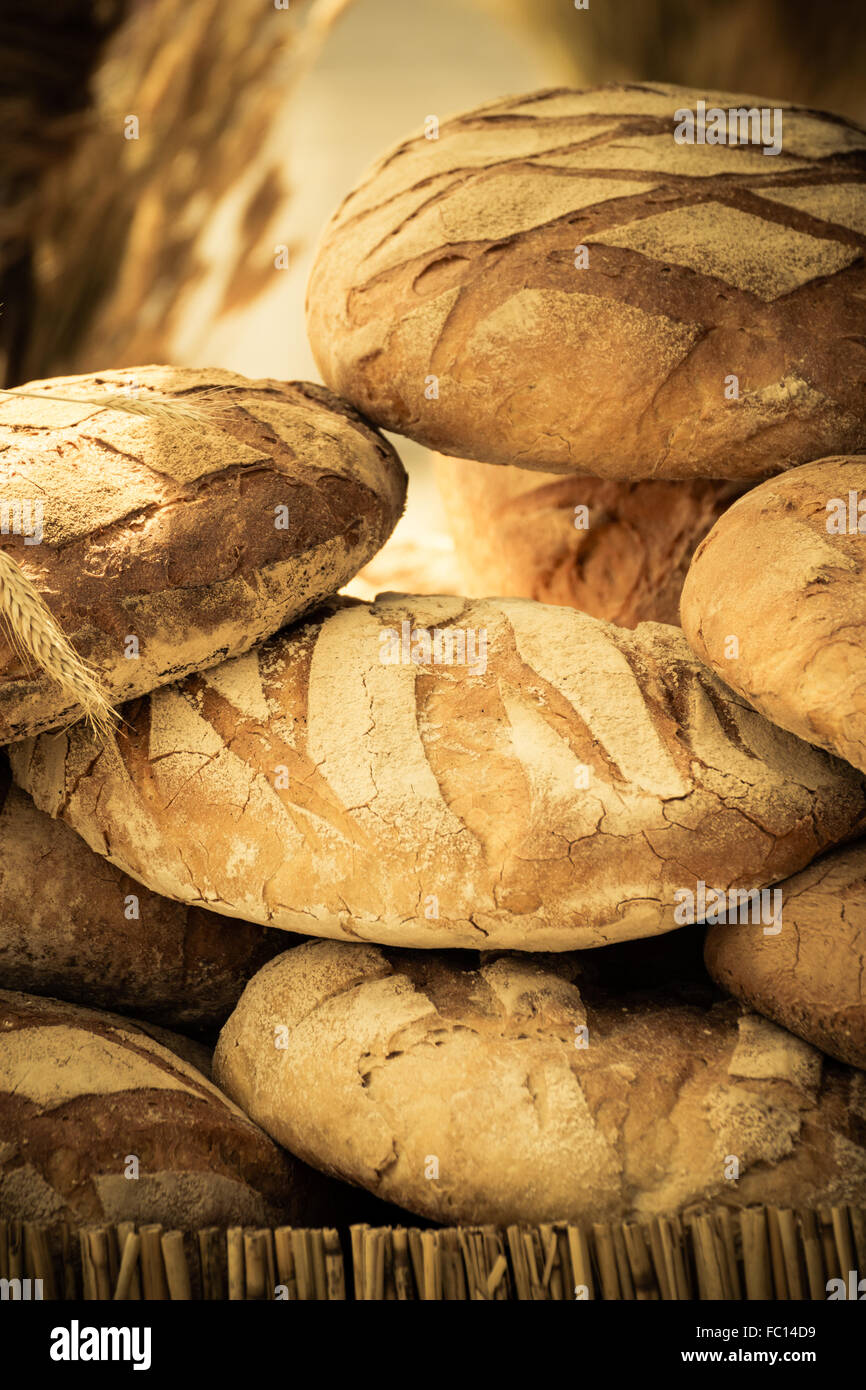 many brown rustic fresh rye bread loaves Stock Photo - Alamy