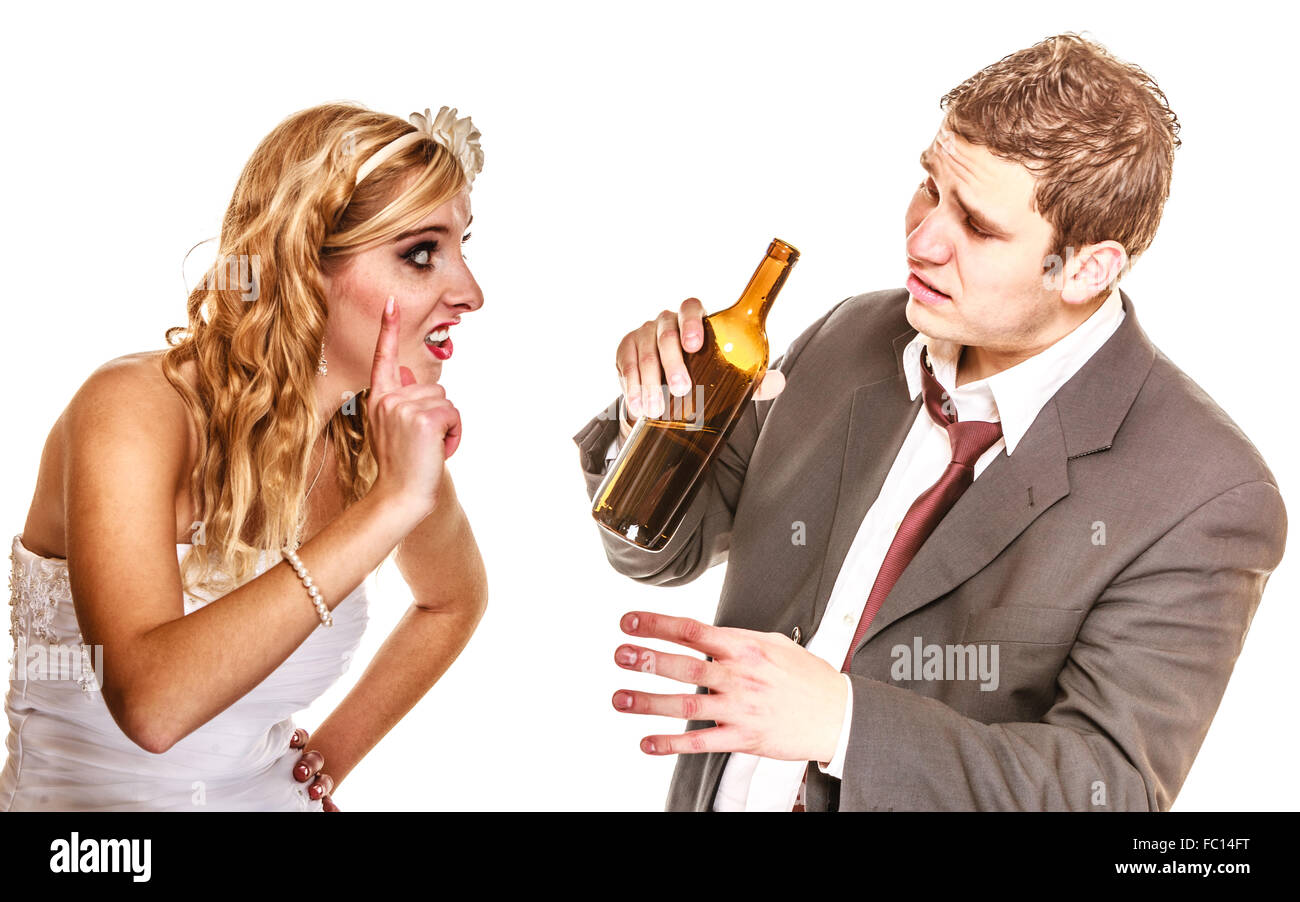 Wedding couple, bride with alcoholic drinking groom Stock Photo - Alamy