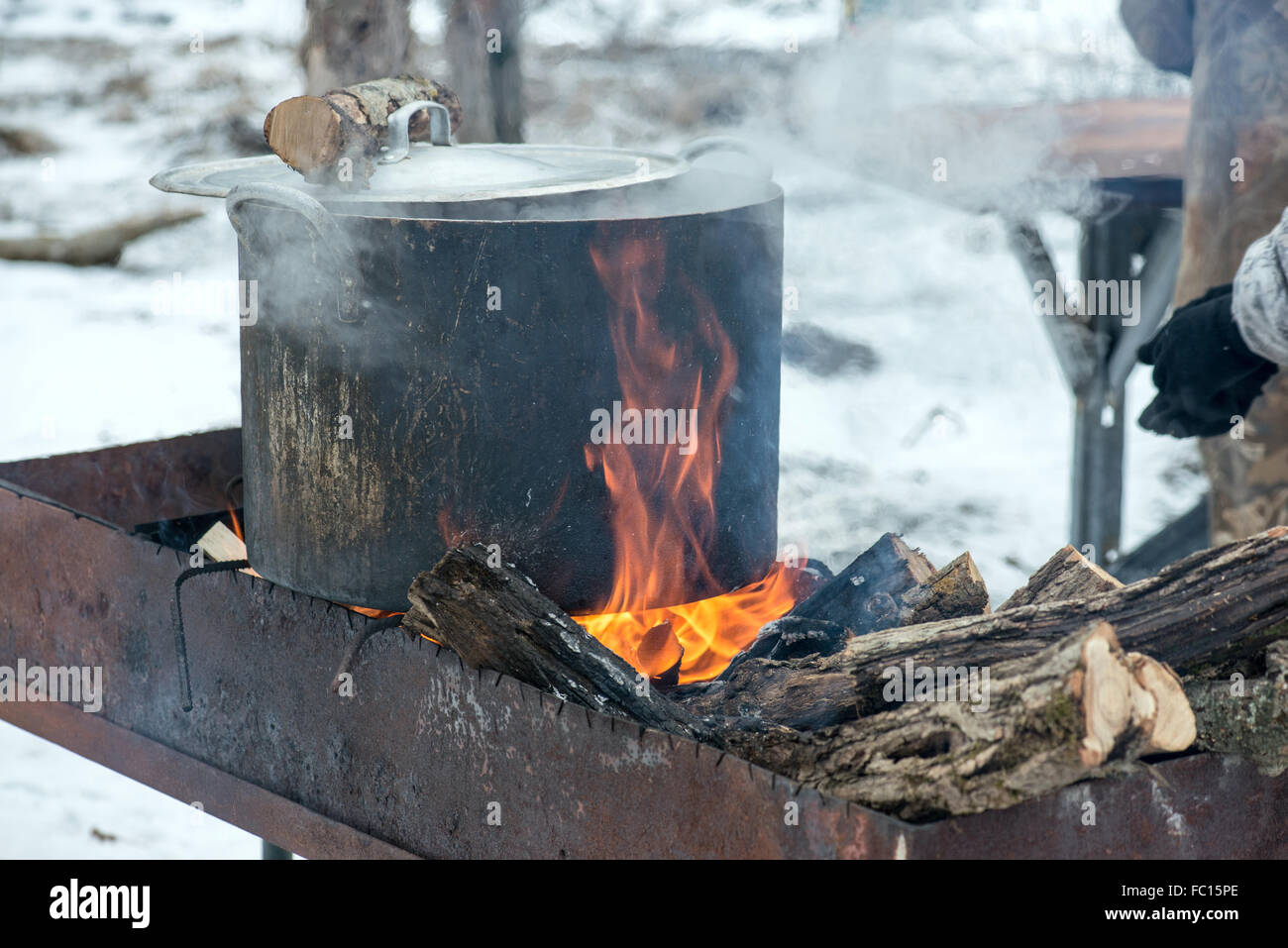 Boiling water on campfire hi-res stock photography and images - Alamy