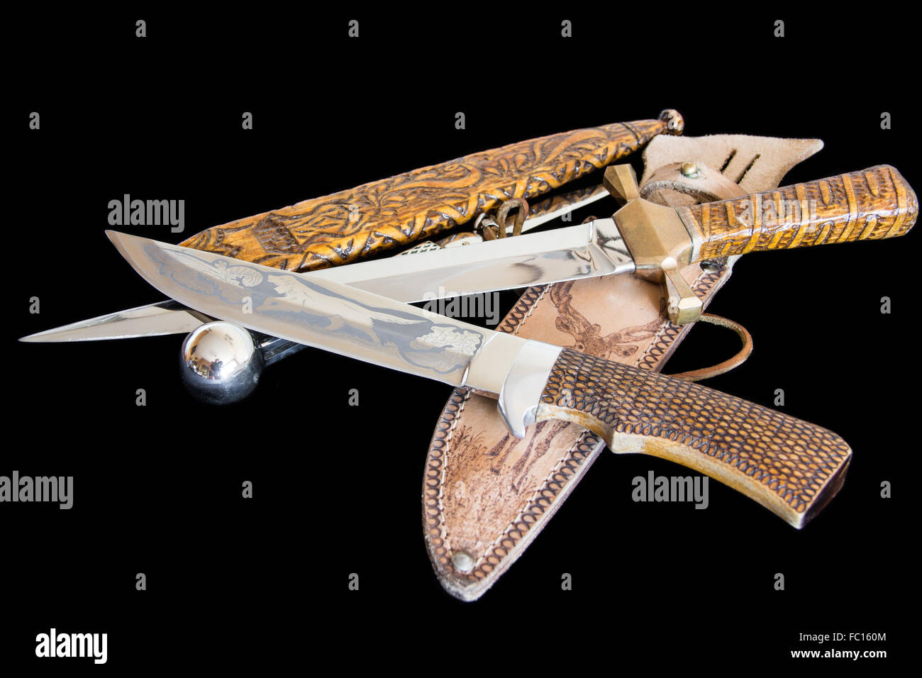 Cold weapon on black background Stock Photo - Alamy