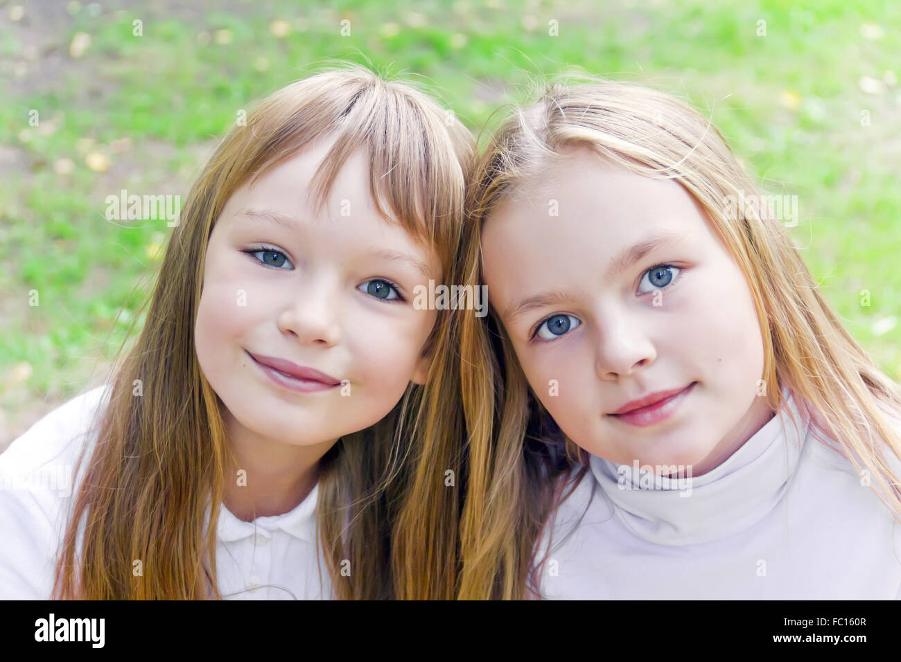 Cute two girls Stock Photo - Alamy